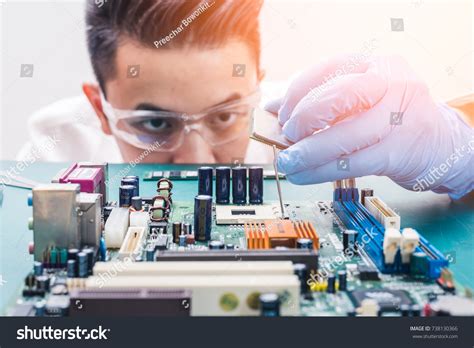 Asian Technician Putting Cpu On Socket Stock Photo Shutterstock