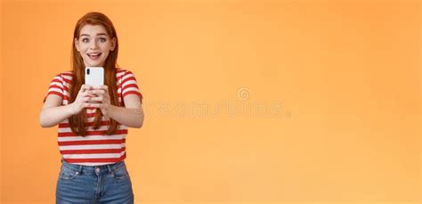 Amused Excited Redhead Female Record Video Thrilled See Famous Person
