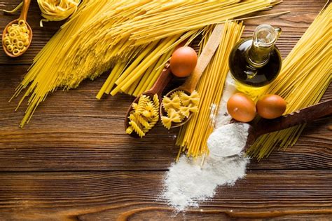 Premium Photo Pasta Of Different Types And Varieties Raw On A Spoon