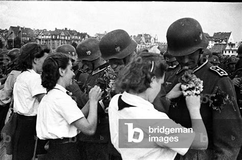 Image Of Nazi Germany Hitler Youth Girls Pin Flowers On Army Soldiers