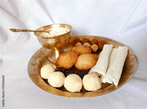 Assamese Traditional Food Items Like Pitha Laddu Doi Sira With Assamese Gamosa Background With