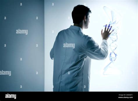 Dna Research Composite Image Researcher Examining A Three Dimensional