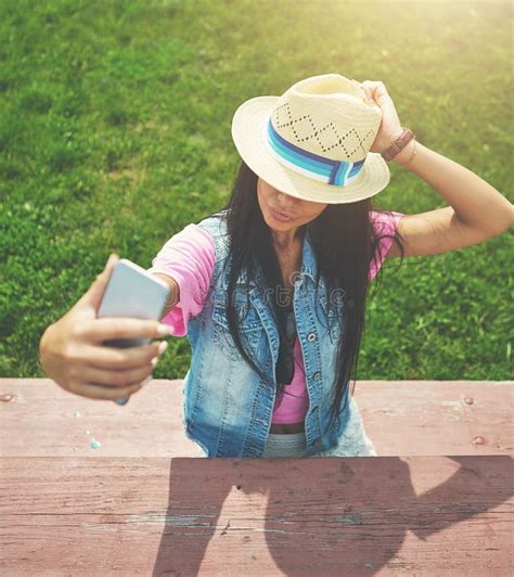 Summer Is A Time For Selfies An Attractive Young Woman Taking Selfies