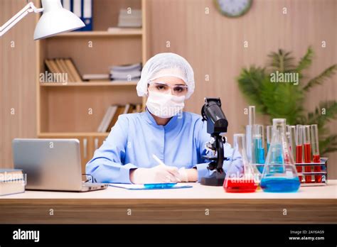 Lab Chemist Working With Microscope And Tubes Stock Photo Alamy