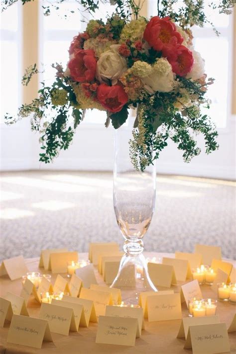 hand calligraphed tented table assignments with a beautiful arrnagement