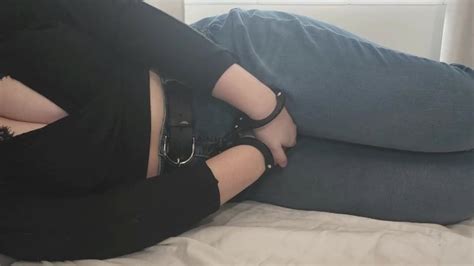 Cuffed Girl Desperately Wets Jeans On Bed Omorashijeans Wettingpee Pantshandcuffed Pee