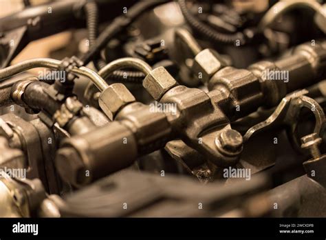 Close Up Photo Of Common Rail Diesel Injectors Highlighting The