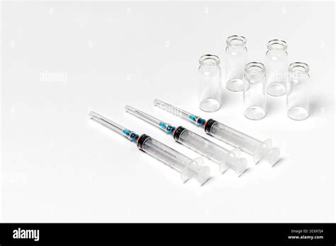 Medical Vials And Hypodermic Syringes Isolated On White Background Treatment Cure Background