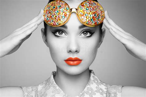 Portrait Of Beautiful Young Woman With Colored Glasses Stock Image