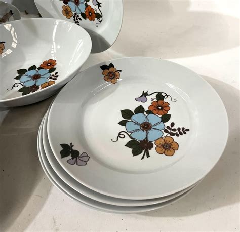 Lot - A Mid-Century Kahla, Germany Dinner Service with Floral Detail