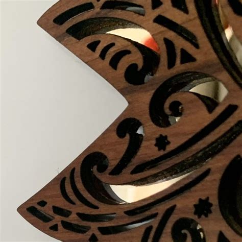 koru whetu matariki star — rimu mirror michel tuffery