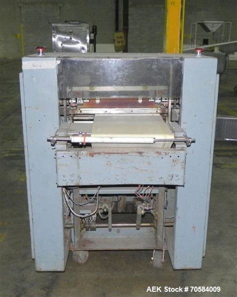 Used Shanklin Model F1 Shrink Wrapper Machine Is Rated At Up To 50
