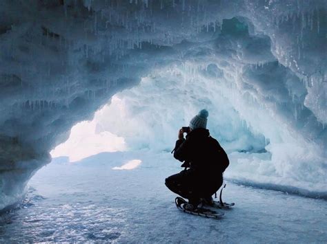 Premium Photo Woman In Crouching In Frozen Cave