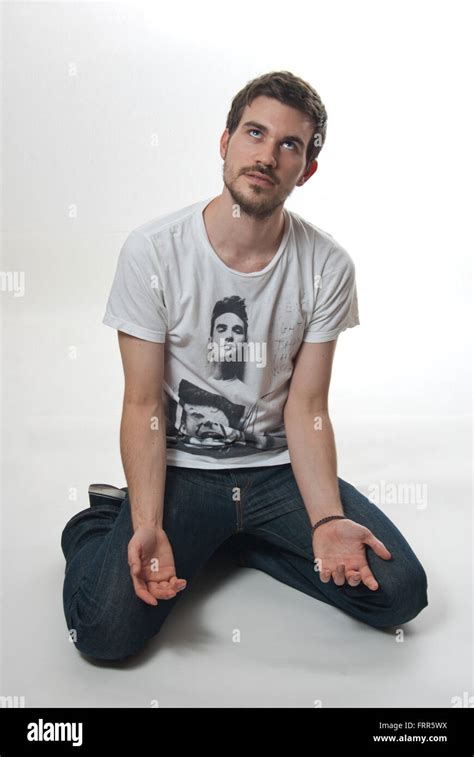 Young Attractive Man On His Knees Like He Has Suffered A Defeat Stock