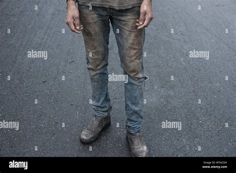 Man At Work With Very Dirty Clothes Stock Photo Alamy