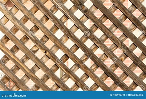 Wooden Lattice On A Brick Wall Background Wooden Texture Royalty Free