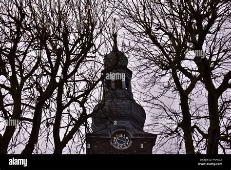 Branches Embracing The Clock Stock Photo Alamy