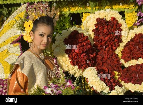 Beautiful Girl In Traditional Costume On The Sarawak Float At The