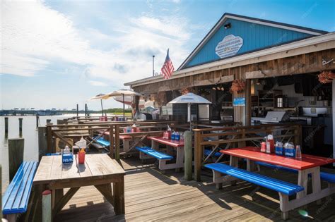 Premium Ai Image Classic Seafood Shack With Picnic Tables And Paper
