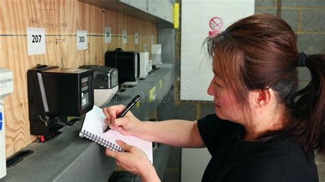 A Woman Writes Down The Electricity Meter Reading On A Notepad 4k Stock Video Video Of