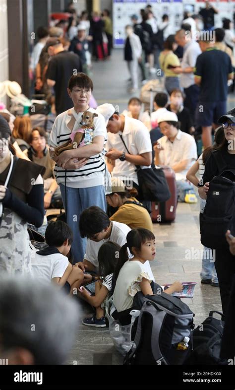 Shinkansen Bullet Train At JR Hakata Station Is Crowded With Passengers
