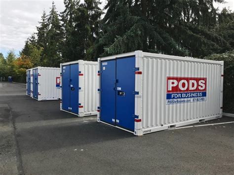 Three Pods Containers In A Government Housing Parking Lot