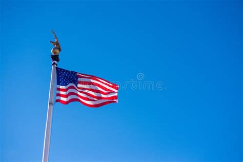 The Flag Of The United States Of America Blowing In The Wind Stock