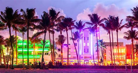 Miami Beach Ocean Drive Hotels And Restaurants At Sunset City Skyline