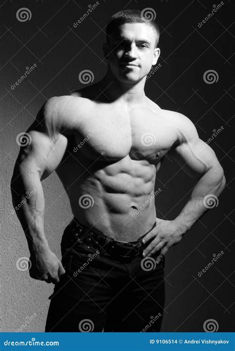 Muscular Bodybuilder Showing His Side Triceps Royalty Free Stock