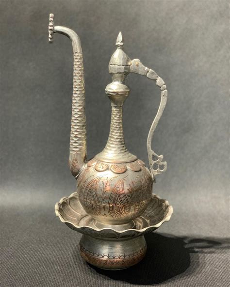 آفتابه لگن مسی نقش دار آنتیک ارتفاع با لگن ۴۰ سانت مرجع تخصصي فروش