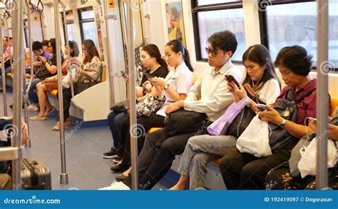 BANGKOK THAILAND 13 JULY 2019 Asian Passengers In Train Using