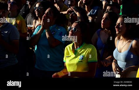 Woman Wearing Sun Glasses Facing Face Moment On The First Game On The