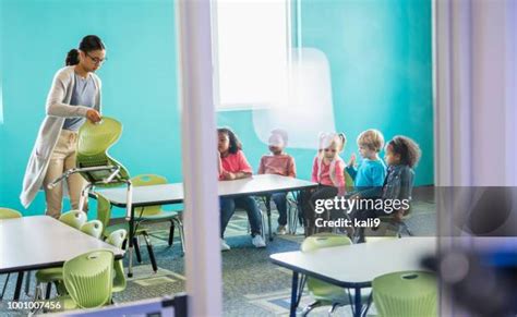 Teacher Preparing Classroom Photos And Premium High Res Pictures