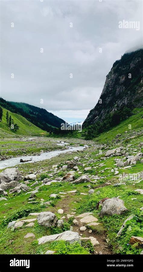 A Vertical Shot Of A Stream Flowing Through The Scenic Hampta Pass With