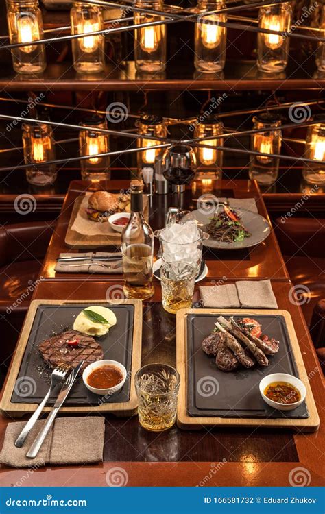 Gourmet Meals Assorted Set On Wooden Table Buffet At Restaurant With