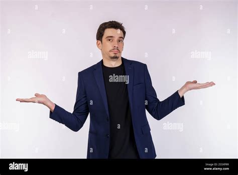 Portrait Of Puzzled Clueless Young Businessman Arms Out Asking Why Whats The Problem Who Cares