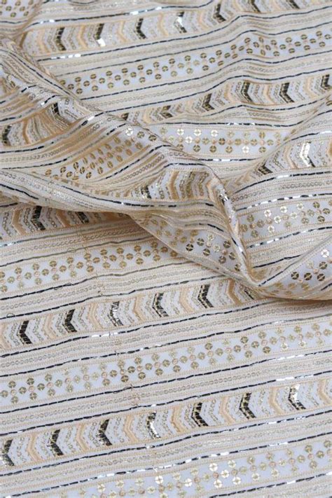 Buy Geometric Foil Work Embroidered Raw Silk Fabric Online Fabric Pitara