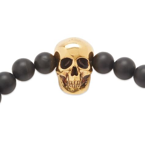 Alexander Mcqueen Skull Beaded Bracelet Black And Gold End Us