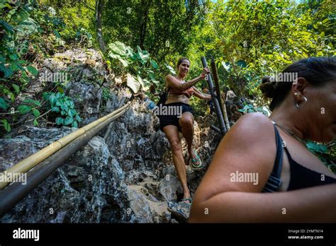 Foreign Tourists Walk Down After Visit Tham Poukham Cave In Blue Lagoon