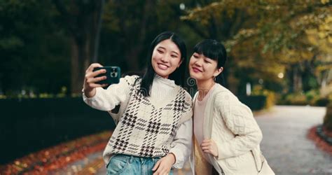Japanese Women Friends And Selfie For Memory Playful Or Social Media