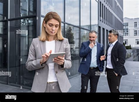 Harassment At Work Group Of Business People Outside Office Building
