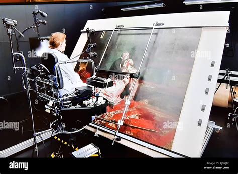 Moscow The Screen With Demonstration Of Restoration Works Of A Picture Of Ilya Repin Ivan The