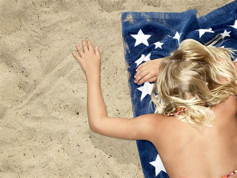 Girl On Towel At The Beach Stock Image F0038966 Science Photo Library