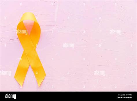 Yellow Ribbon Symbolic Color Sarcoma Bone Cancer Pink Backdrop Stock