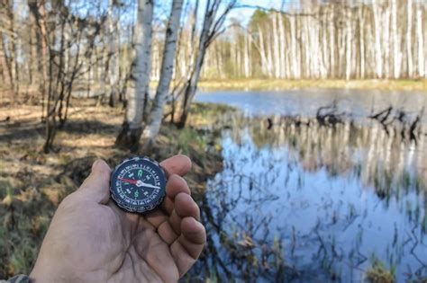 Premium Photo Compass In Hand