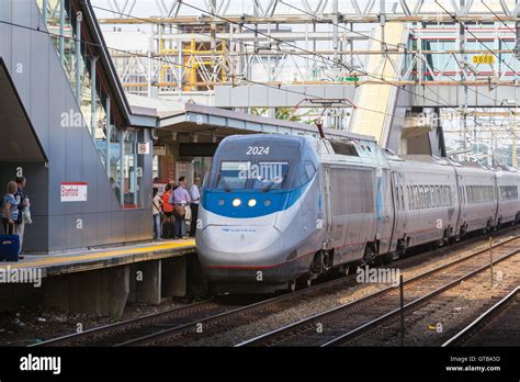 Passengers Board A Southbound Amtrak Acela Express Train In Stamford