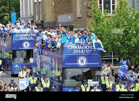 Chelsea Football Club Players And Staff Take A Victory Parade On An Open Top Bus After Winning