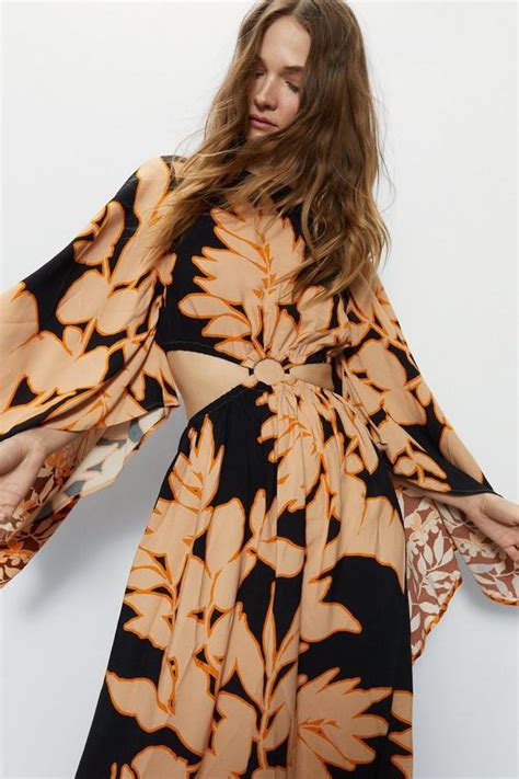 Dresses Floral Border Print O Ring Fluted Sleeve Maxi Dress Warehouse