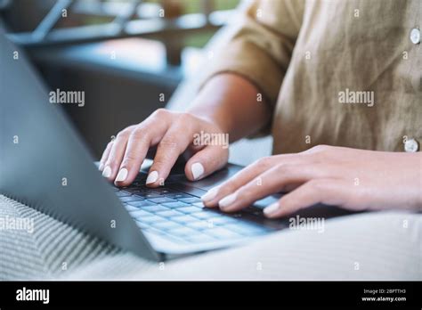 Closeup Image Of Woman S Hands Using And Typing On Laptop Keyboard Stock Photo Alamy