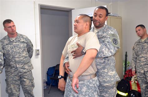 Military Police Medics At Camp Zama Conduct Collaborative CPR Training